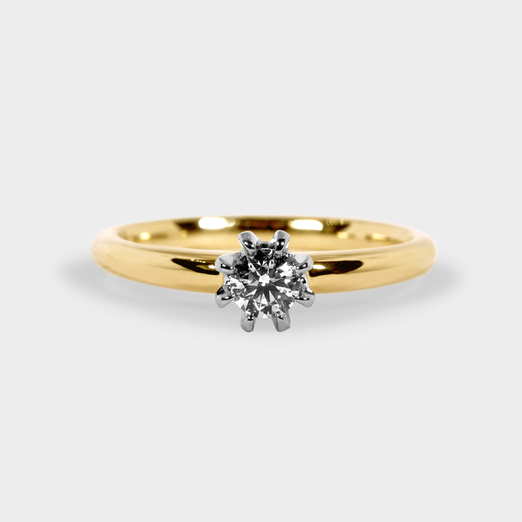 Solitario oro amarillo con engaste 8 grifas en oro blanco – Helmlinger ...